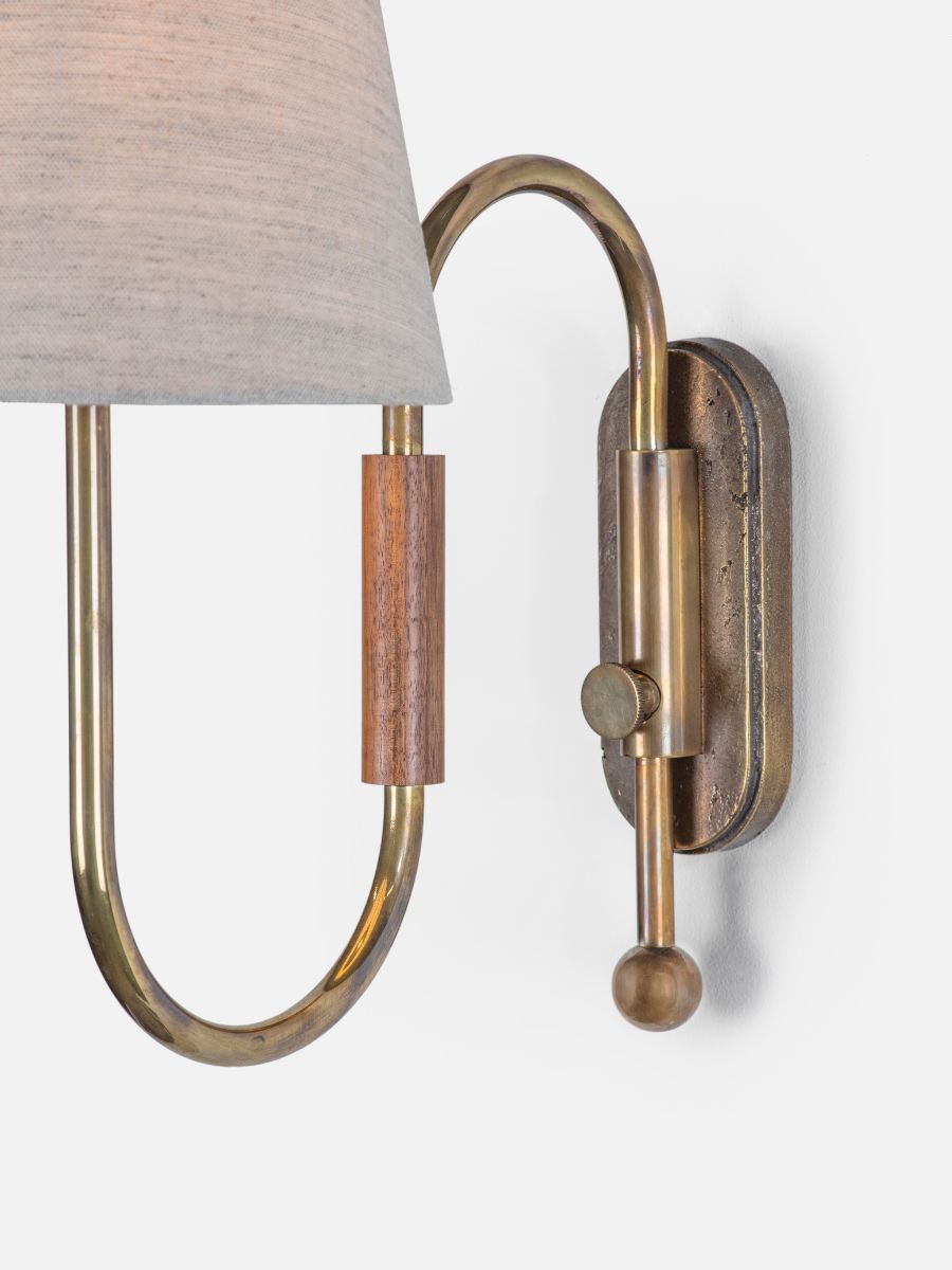 Cooden Wall Light - A Graceful Curved Design with Adjustable Features